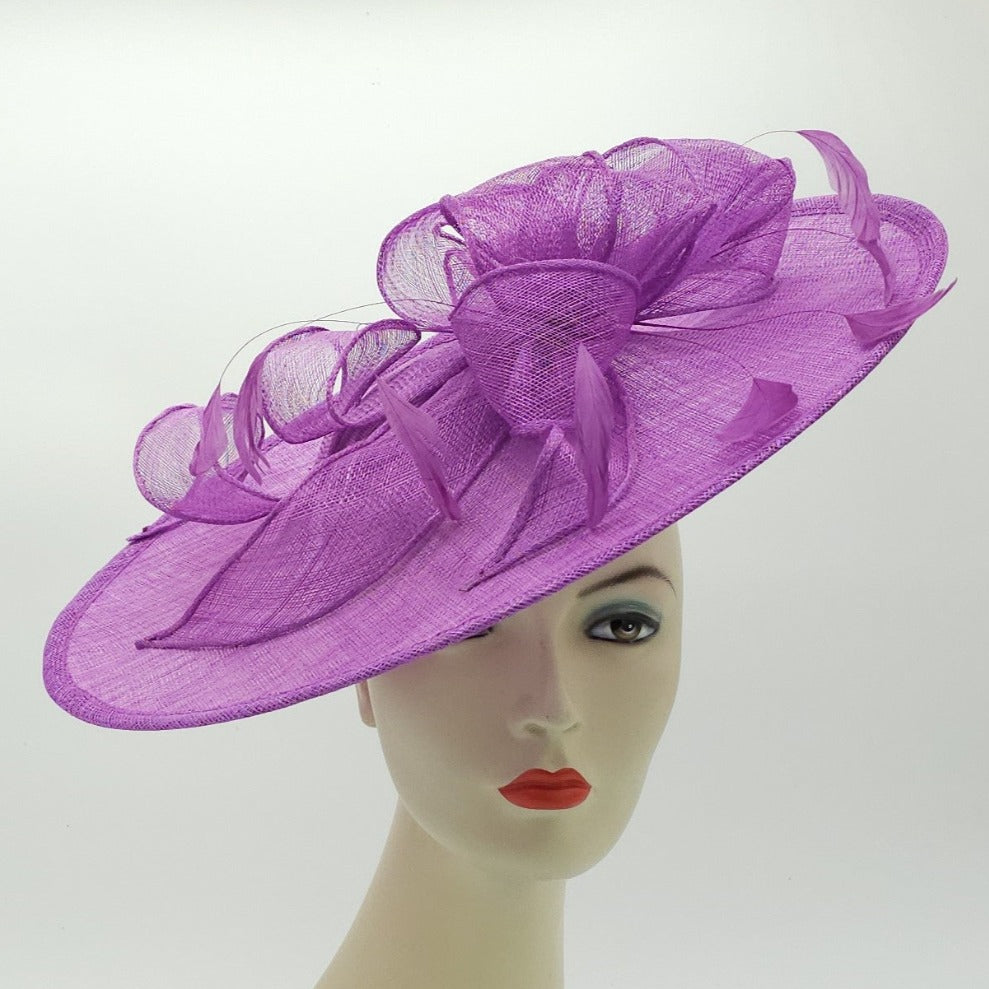 Disc hatinator in Sinamay with large Sinamay Bows, Twists and Feathers ...